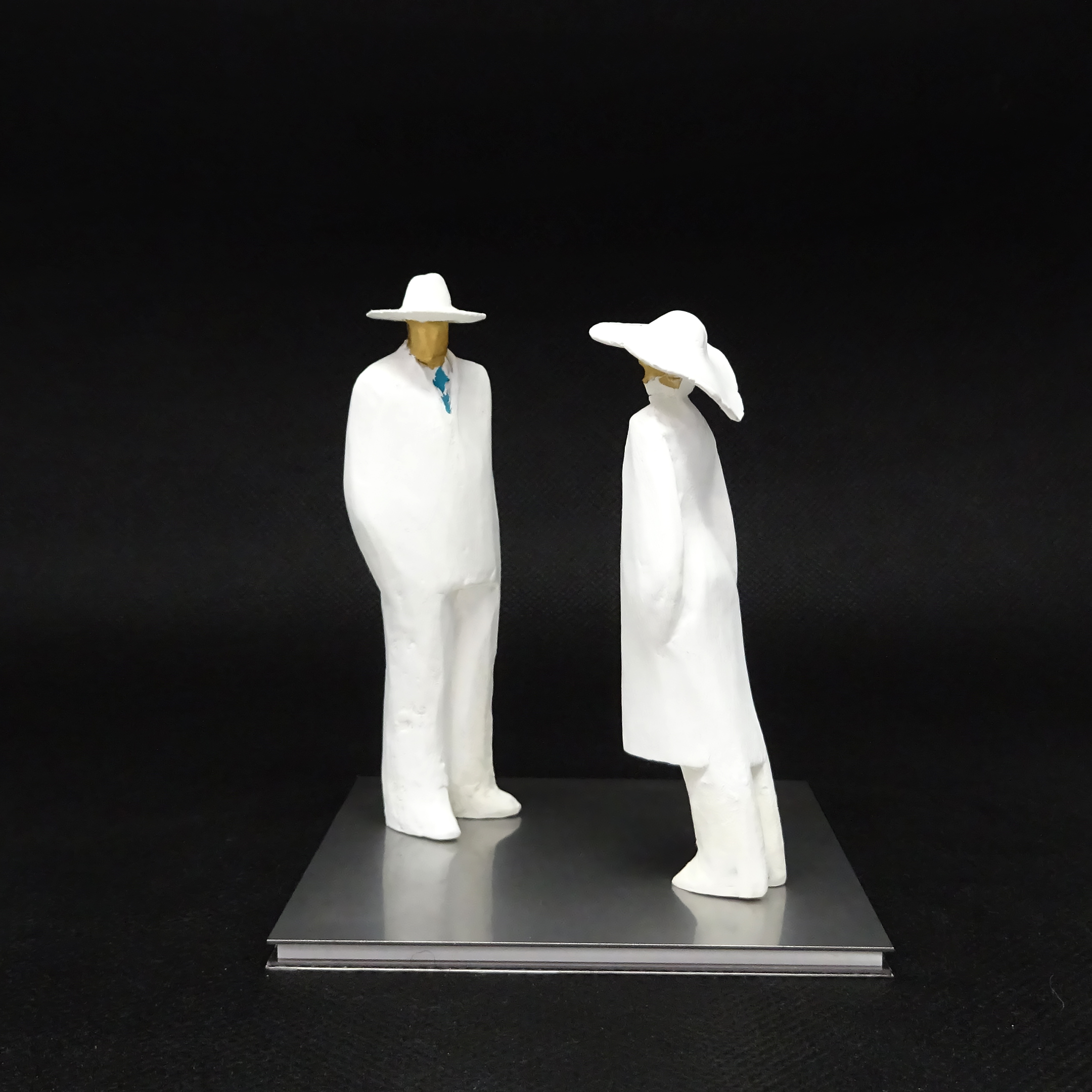 Hatted Couple with a blue tie - Arts Range